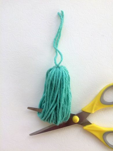How to Make a Yarn Tassel - Sew Crafty Me