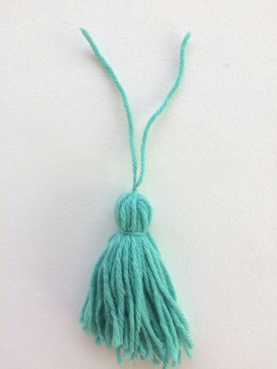 How to Make a Yarn Tassel - Sew Crafty Me